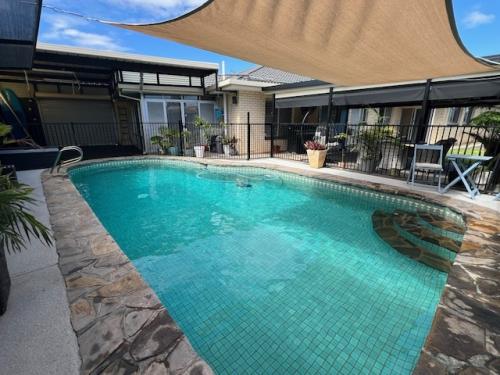 Great Family Home + Entertaining & Swimming Pool - Rob Mackenzie Real ...