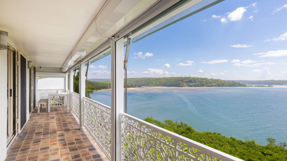 Tringas Property Group - Absolute Waterfront Home with Rainforest ...