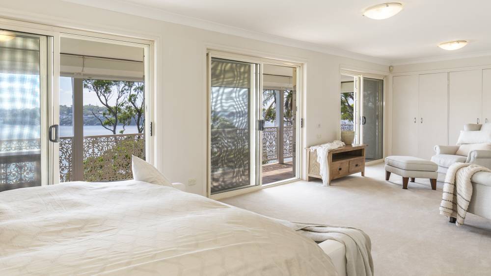 Tringas Property Group - Absolute Waterfront Home with Rainforest ...