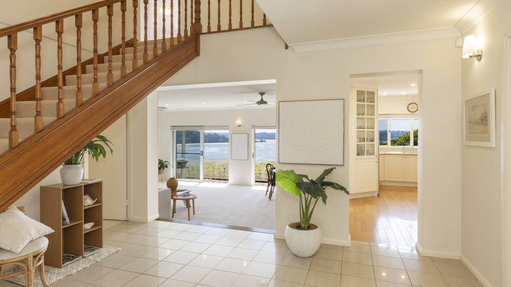 Tringas Property Group - Absolute Waterfront Home with Rainforest ...