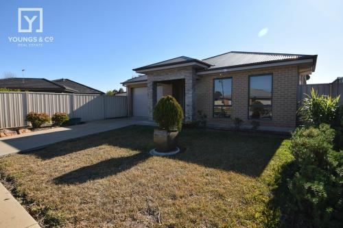 Youngs & Co - MODERN THREE BEDROOM ON A LOW MAINTENANCE BLOCK